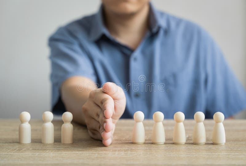 Men Use Barriers or Blocks between Wood Figure Two Groups that are ...