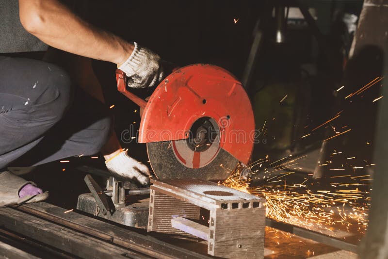 Men Use Electric Grinder on a Workshop Stock Photo - Image of factory ...