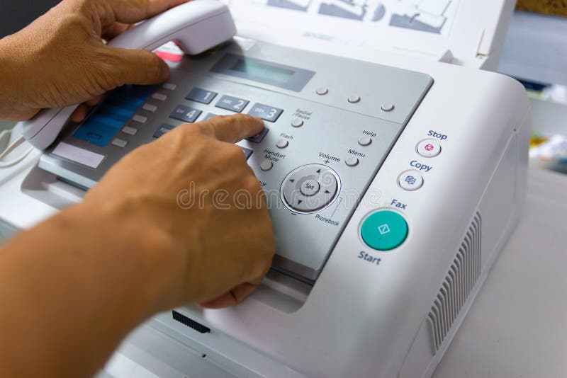 Men are Using a Fax Machine in the Office. Stock Photo - Image of ...
