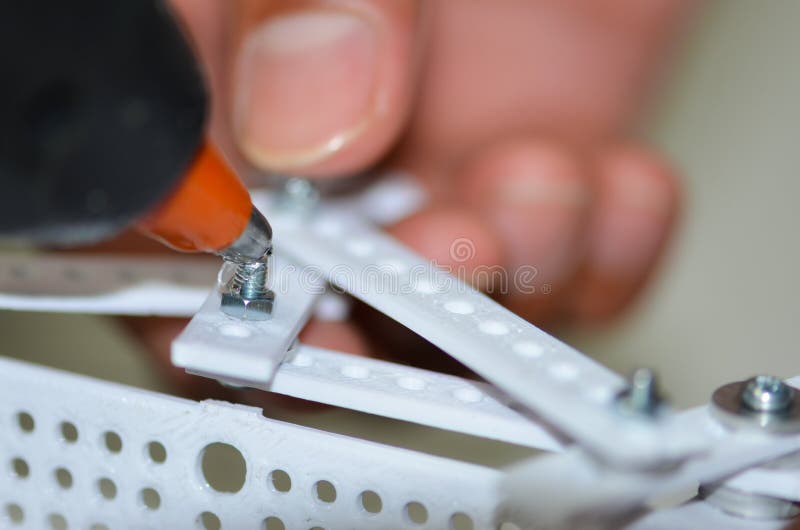 Men are Using Hot Glue To the Device. Stock Photo - Image of glue ...