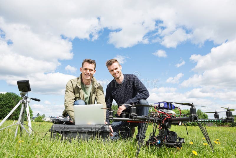 Technicians Using Laptop by UAV Drone Stock Image - Image of people ...