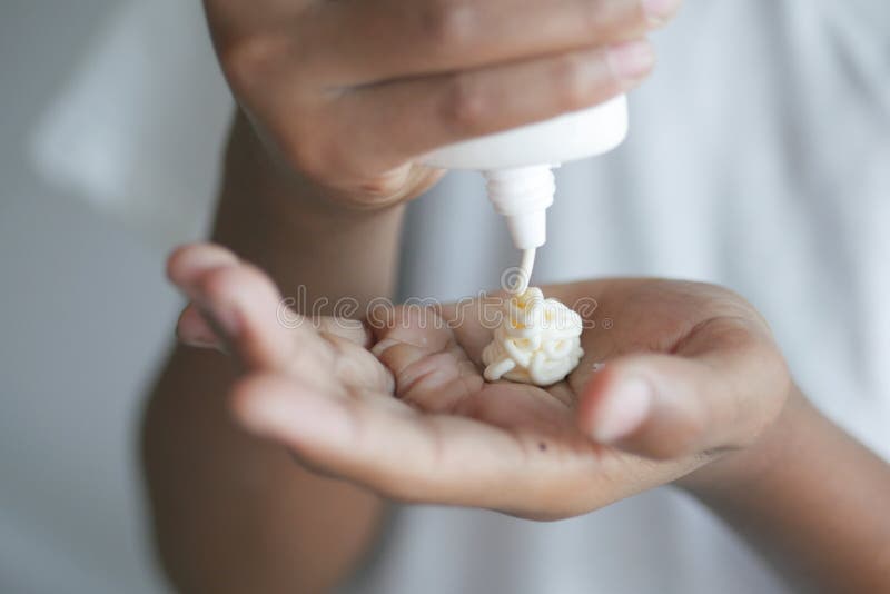 Men Using Sunscreen Cream and Pouring Cream on Hand Stock Image - Image ...