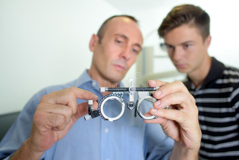 Man and vision check up stock image. Image of young - 270024707