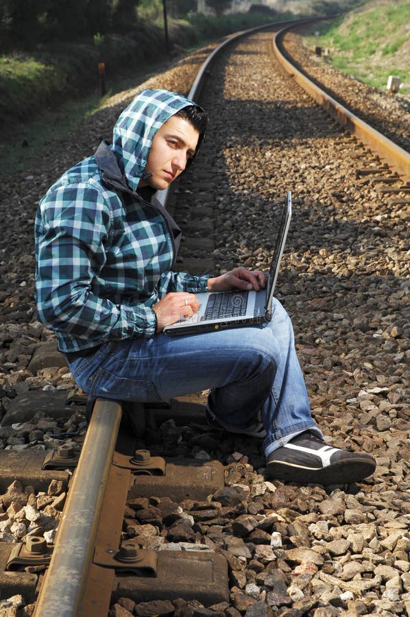Men waiting for the train stock image. Image of route - 8290839