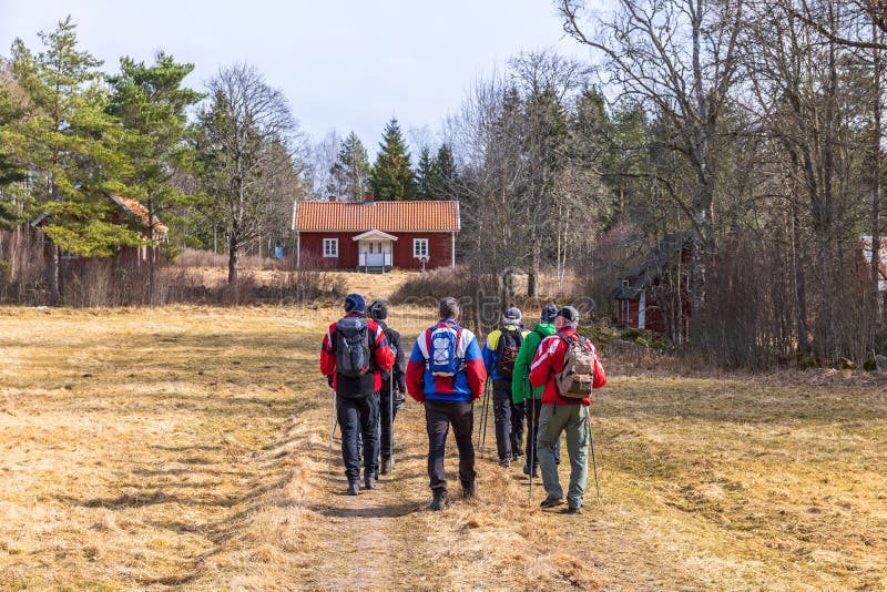 Men Walking To a Red Cottage in the Countryside Editorial Stock Image ...