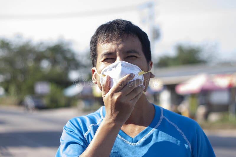 Men Wearing Anti-pollution Masks and Small Dust. Stock Image - Image of ...