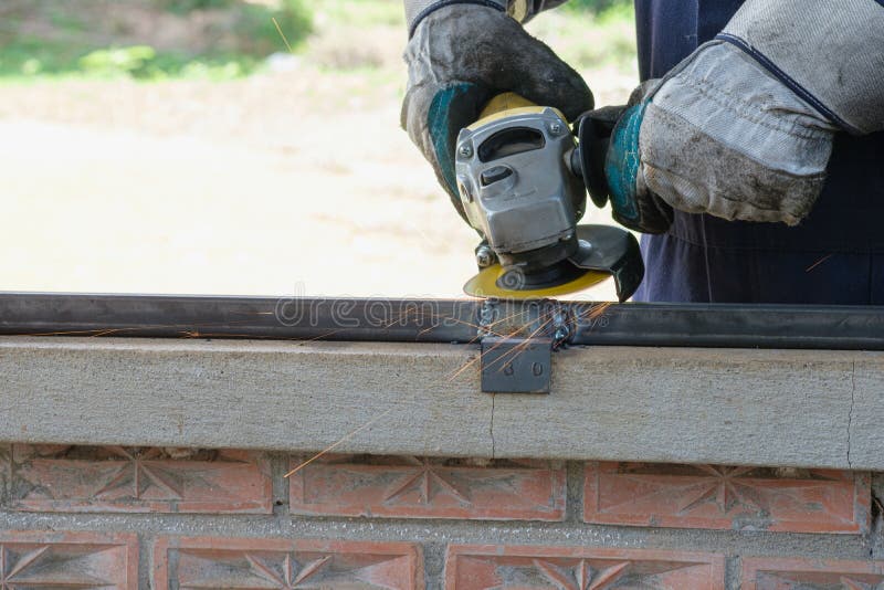 Men Who are Using Grinding Tools Stock Image - Image of mask, factory ...