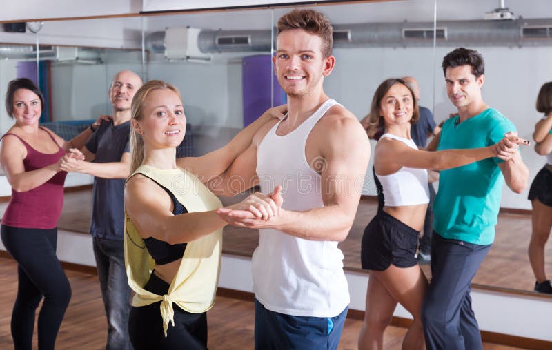 Men and Women Dancing Salsa O Bachata Stock Photo - Image of mirror ...