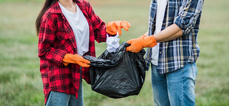 Men and Women Help Each Other To Collect Garbage Stock Photo - Image of ... Men and Women Help Each Other To Collect Garbage Stock Photo - Image of ...