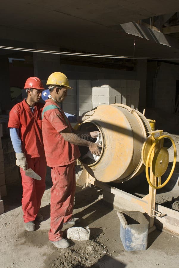 Men Work with Cement Mixer - Vertical Stock Image - Image of crew ...