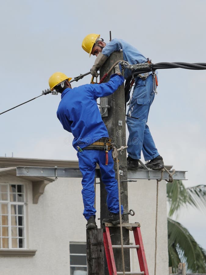 Men at Work on Electricity Column Editorial Stock Photo - Image of ...