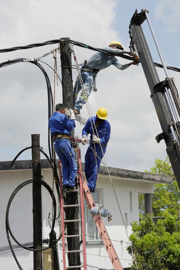 Men at Work on Electricity Column Editorial Stock Image - Image of ...