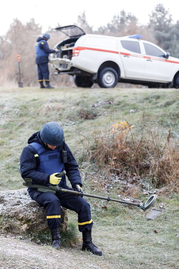 Men Work in Emergencies. Emergency Workers Work Outdoors. a Man in ...