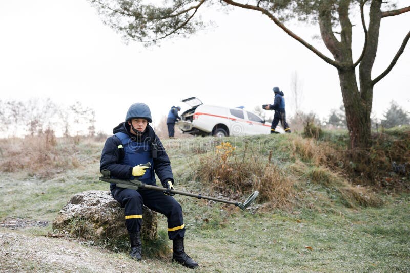 Men Work in Emergencies. Emergency Workers Work Outdoors. a Man in ...