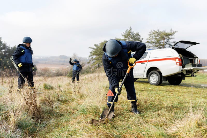Men Work in Emergencies. Emergency Workers Work Outdoors. a Man in ...