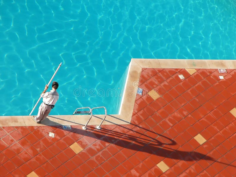 Pool cleaning stock image. Image of work, people, swimming - 12535099