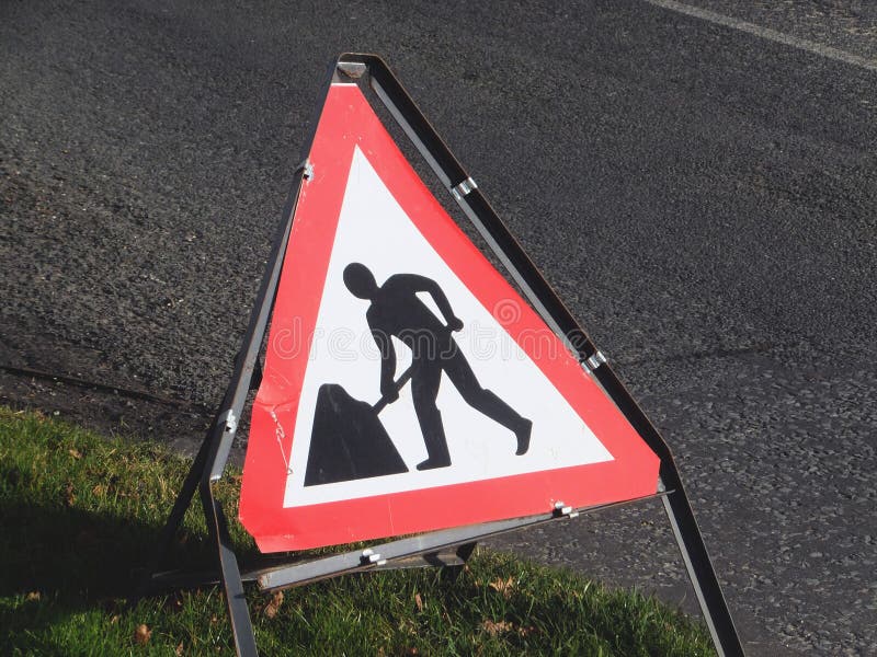 Men at Work Road Sign stock image. Image of england, alert - 88490137
