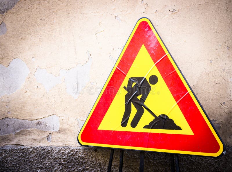 Men at Work Sign at a Road Construction Site Stock Image - Image of ...