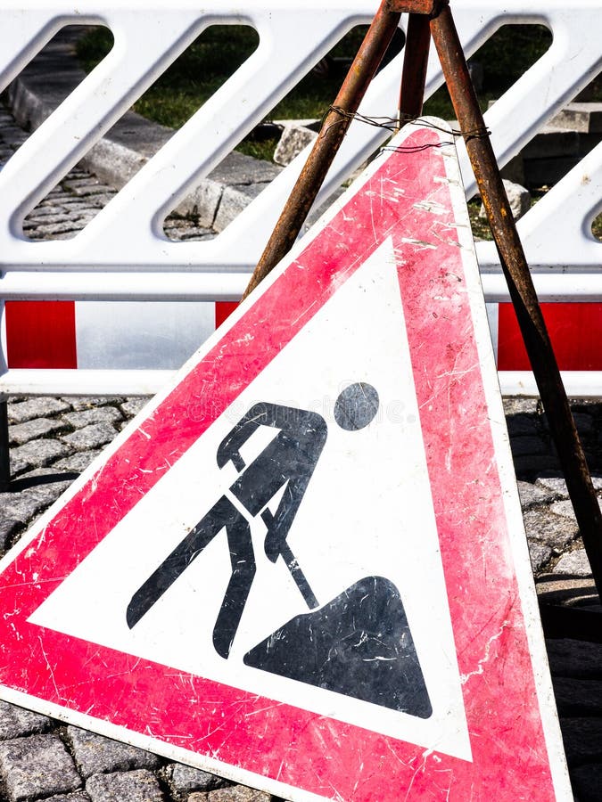 Men At Work Sign Board On The Street. Construction Site, Road ...