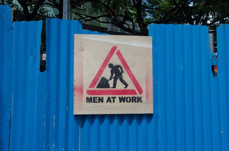 Men at work stock image. Image of construction, fence - 62584367