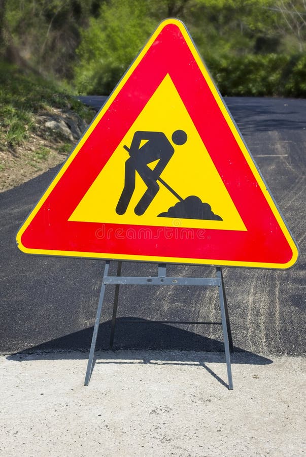 136 Men Work Road Under Construction Sign Photos - Free & Royalty-Free ...