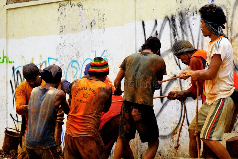 Men Work in a Team To Pull Underground Cable. Editorial Image - Image ...