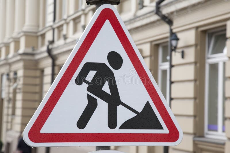 Men at Work Traffic Sign stock image. Image of sign, building - 52376465