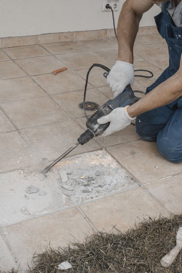 Men Worker are Extracting, Drilling Tiles with Perforator, Selective ...