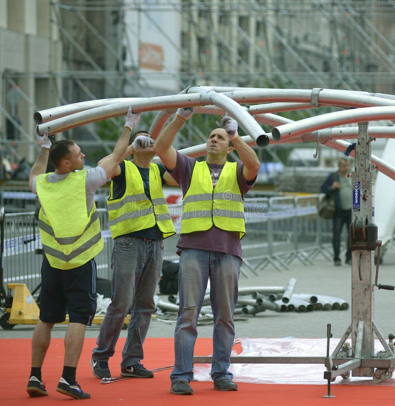 Men Workers Assembling Metal Frame for a Tent. Kyiv, Ukraine Editorial ...
