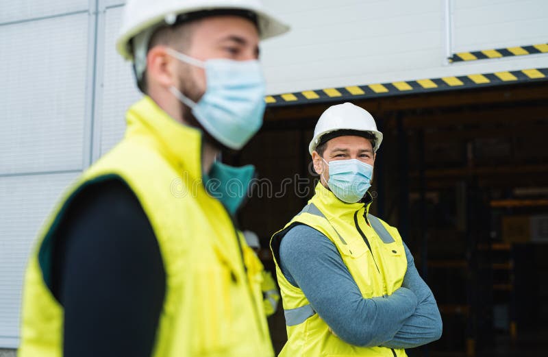 Men Workers with Face Mask Standing in Front of Warehouse, Coronavirus ...