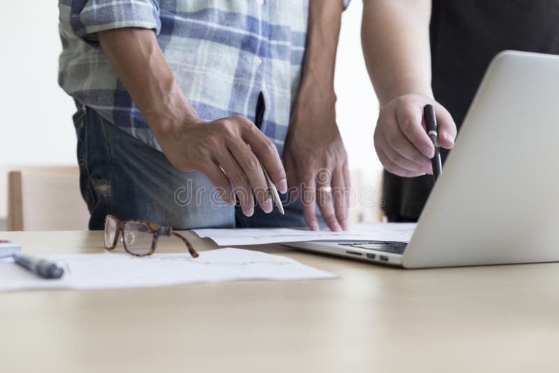 Men Working with Business Document and Computer Notebook Stock Image ...