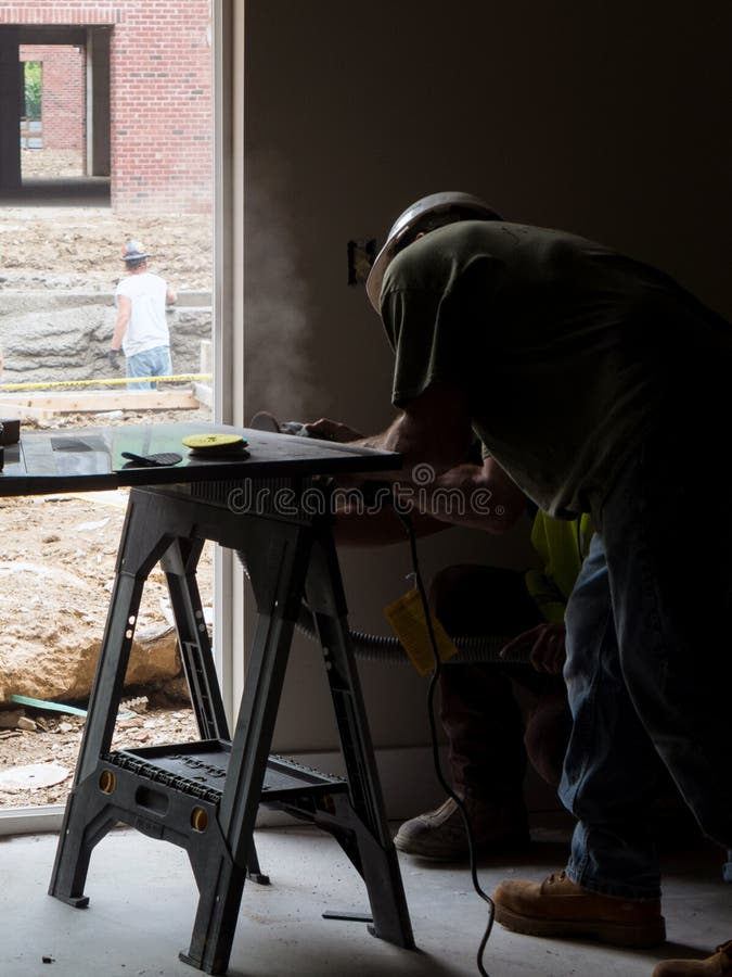 Men Working on Construction Job Site Stock Image - Image of stone ...