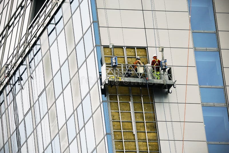 Men Working on Construction Lift Building Modern Glass Structure Stock ...