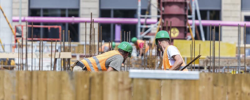 Men Working on a Construction Site Editorial Image - Image of worker ...
