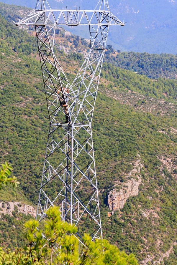 Men Working on an Electricity Pylon Stock Photo - Image of pylon, clear ...