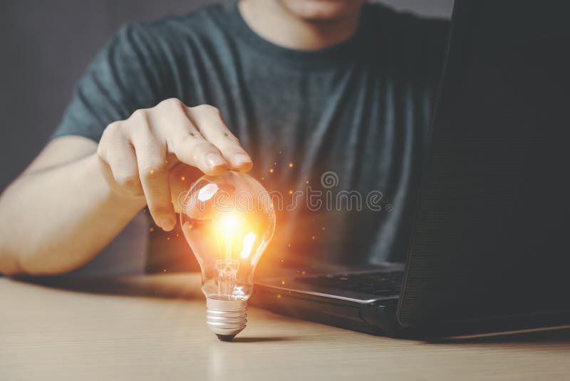 Men Working at Home with Light Bulbs. New Ideas Stock Image - Image of ...