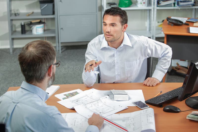 Men working inside office stock photo. Image of cabinets - 104030234