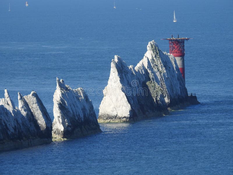 Men Working on the Needles Lighthouse Stock Photo - Image of blue ...