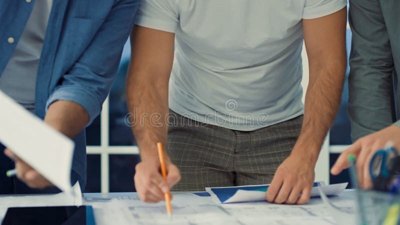 Men Working at Office. Three Men Architectures Working at Office. Hands ...
