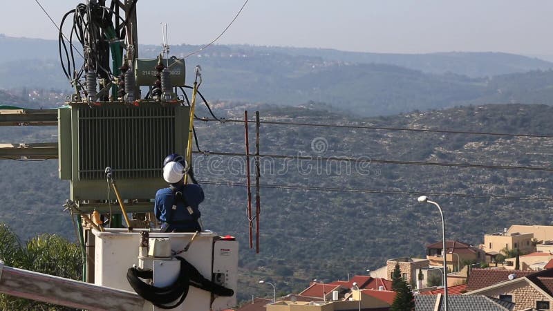 Men working on power lines stock video. Video of crane - 53563713
