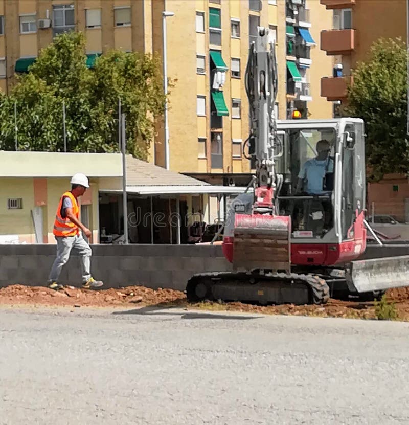 Men working on the road editorial photography. Image of working - 133680747