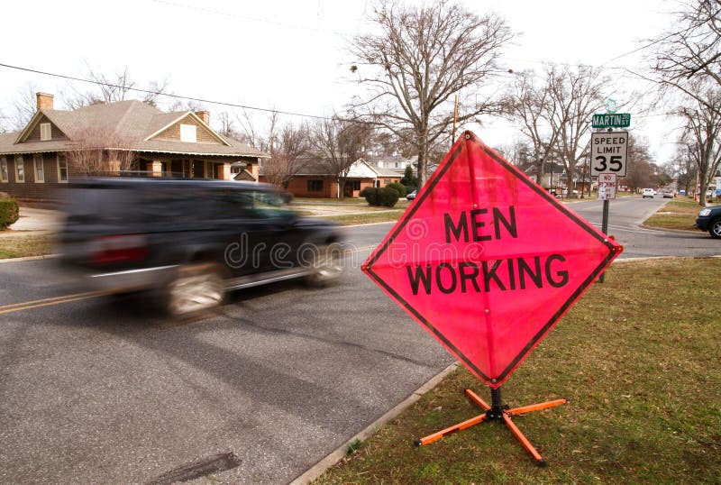 Men working sign stock photo. Image of work, sign, road - 4180794