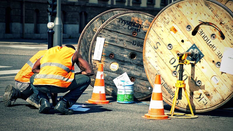 Men Working in the Street in France Editorial Photo - Image of urban ...
