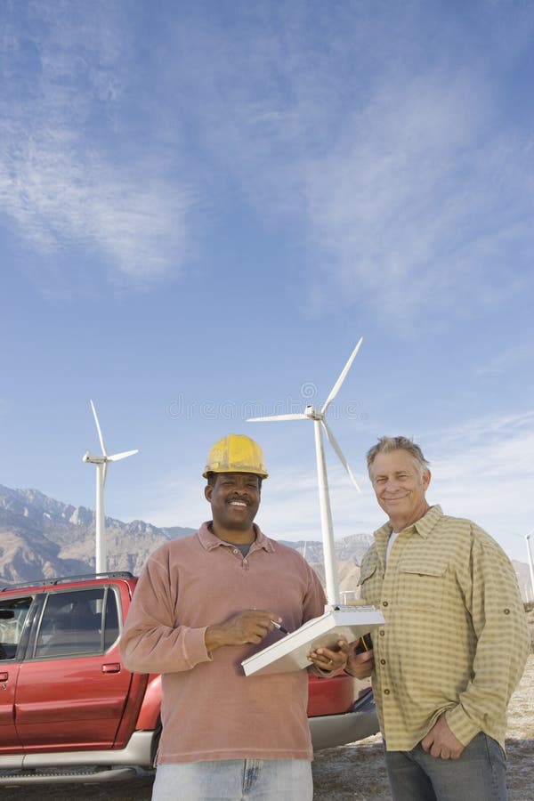 Men Working at Wind Farm stock photo. Image of hardhat - 29665722