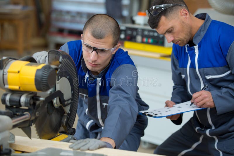 Men in Workshop Sawing Wood with Circular Saw Stock Image - Image of ...