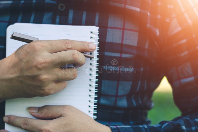 Men Write a Note on the Paper Record Stock Photo - Image of green ...