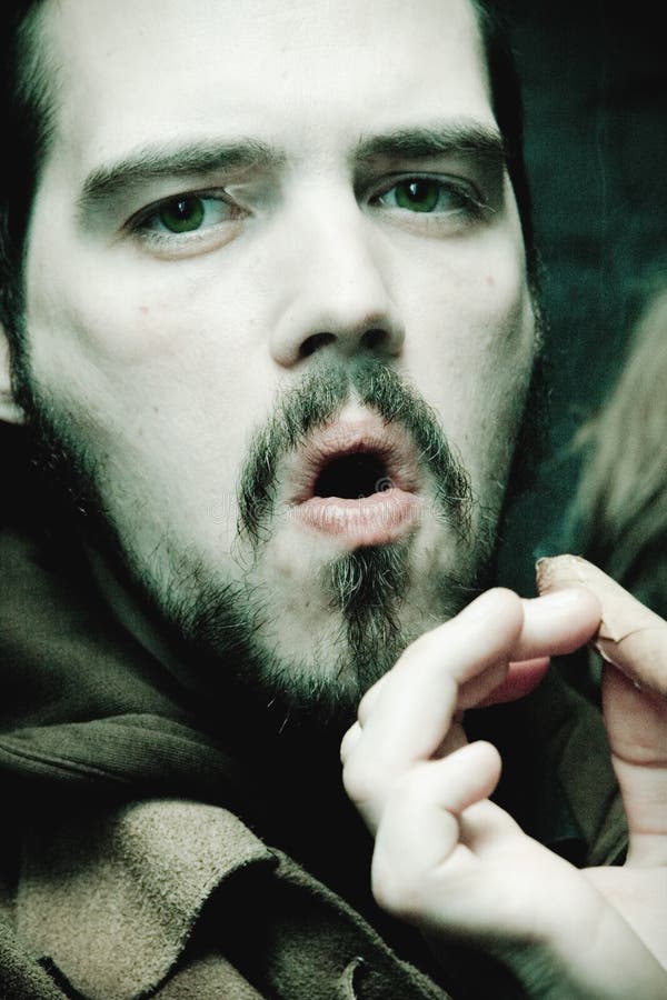 Menacing Guy Smoking Cigar stock image. Image of inhales - 2022635