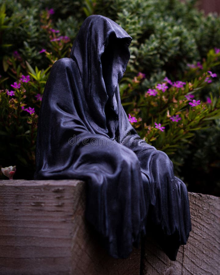 Menacing Statue of the Grim Reaper, Cloaked in a Long, Flowing Robe ...