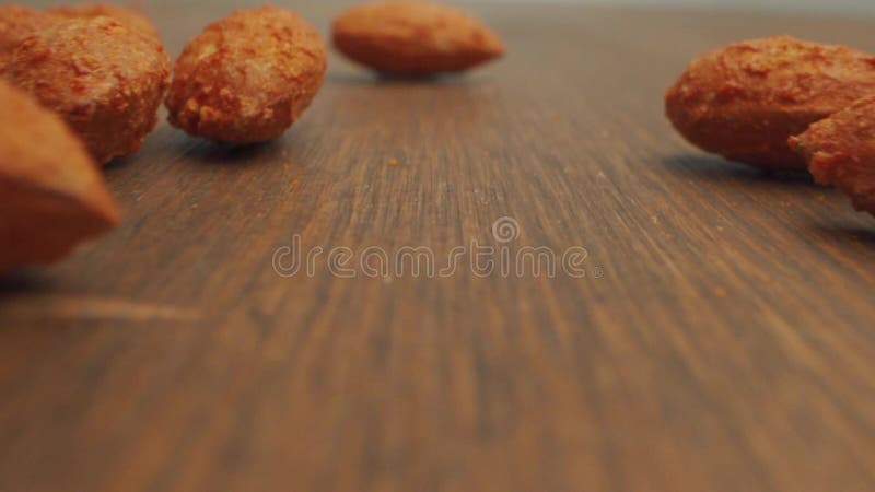 Mendal Nuts Jumps on the Table. Nuts - the Mendal Jumps Across the ...