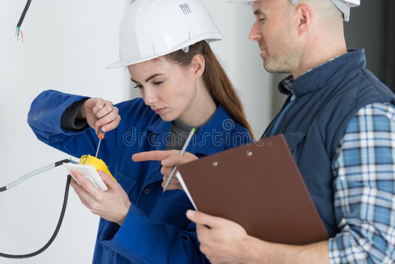 She mending wires stock photo. Image of teaching, apprenticeship ...